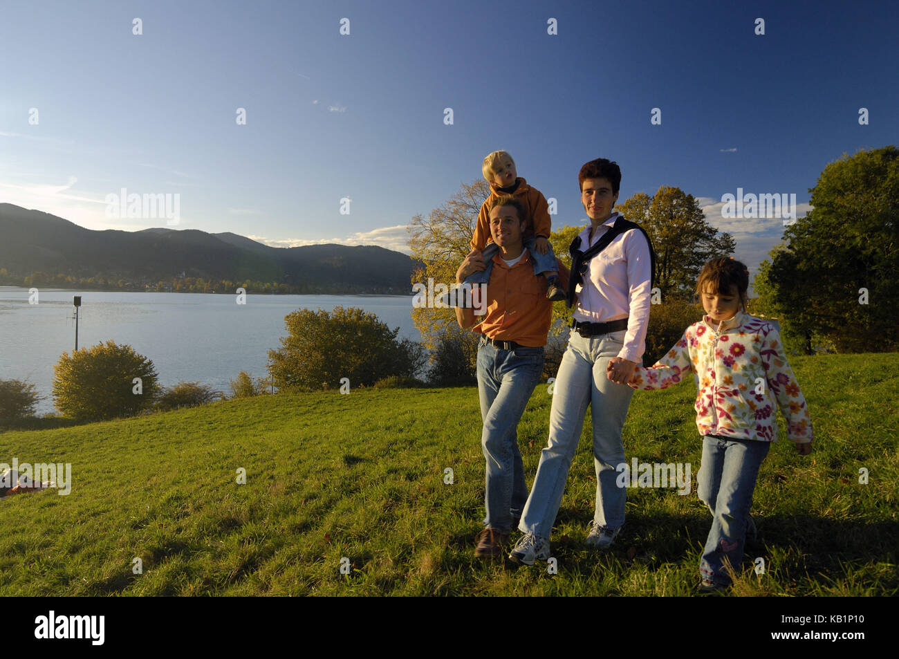 family hiking at the Tegernsee, Bavaria, Germany Stock Photo - Alamy