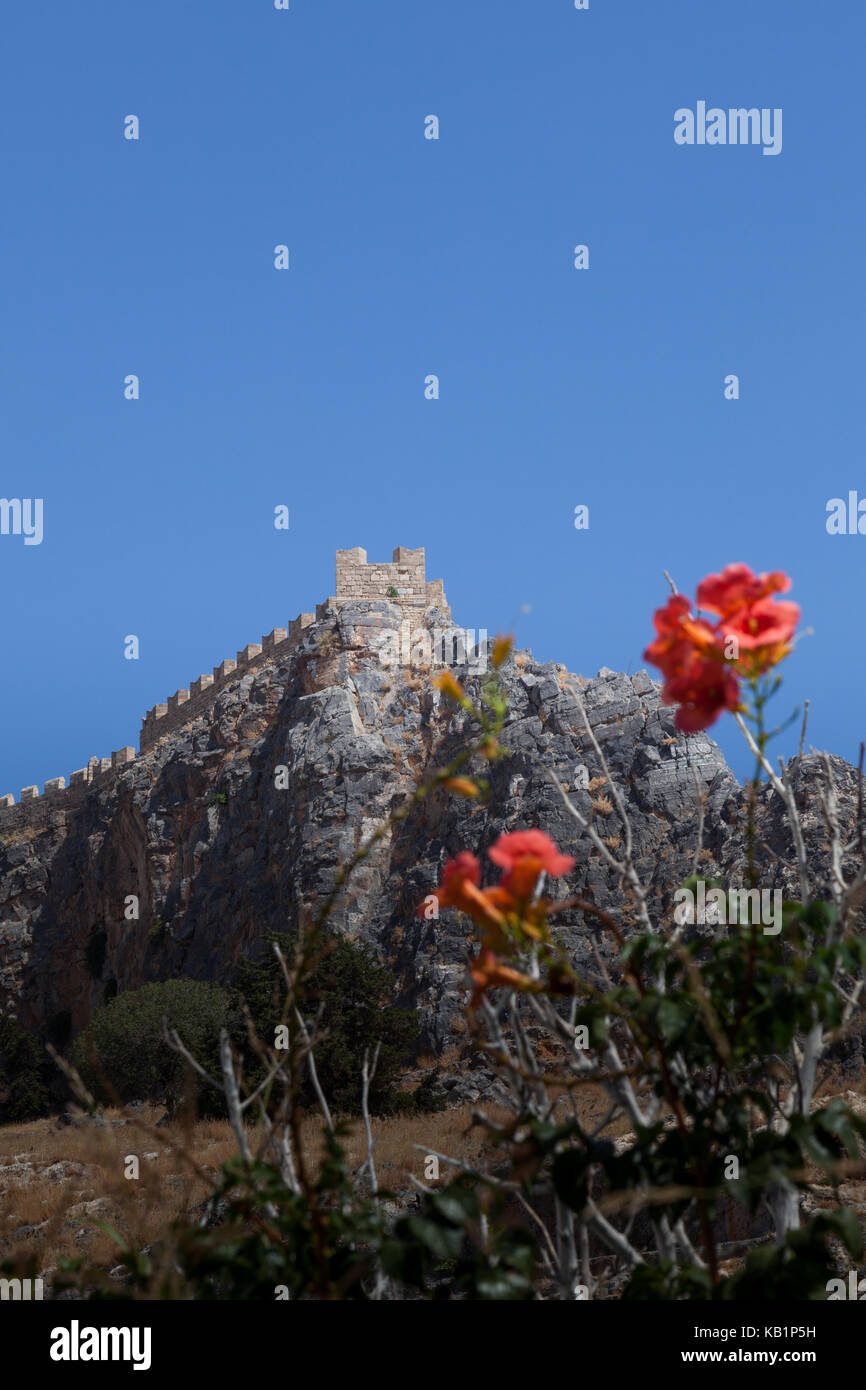 The Acropolis and castle in Lindos on the island of Rhodes in Greece ...