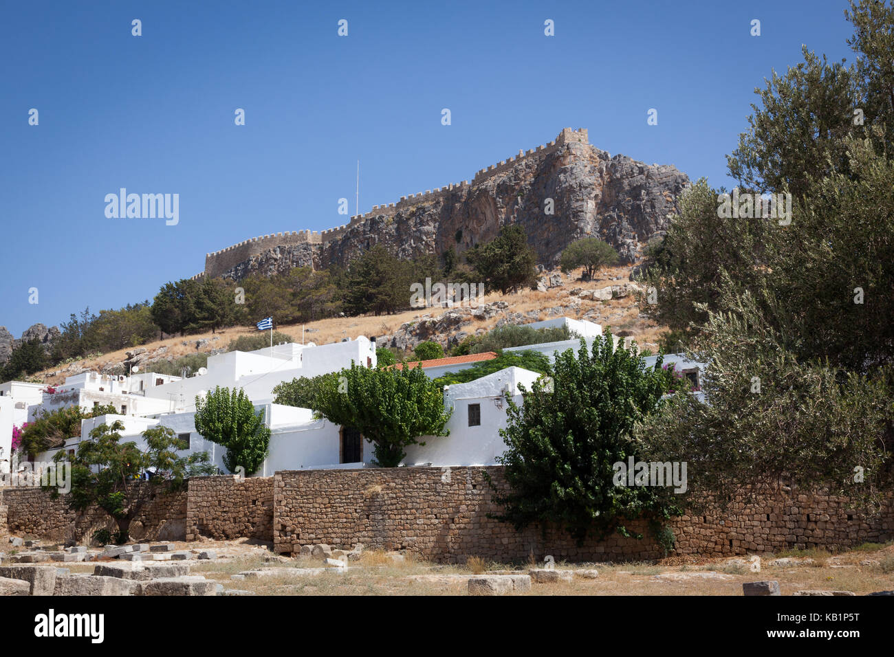 The Acropolis and castle in Lindos on the island of Rhodes in Greece ...