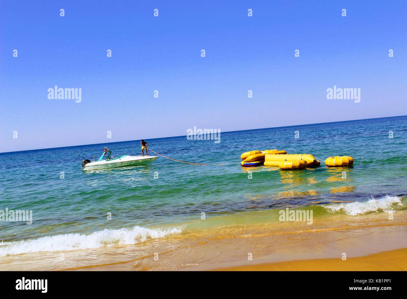 Transportation of an inflatable raft for water entertainment with the ...