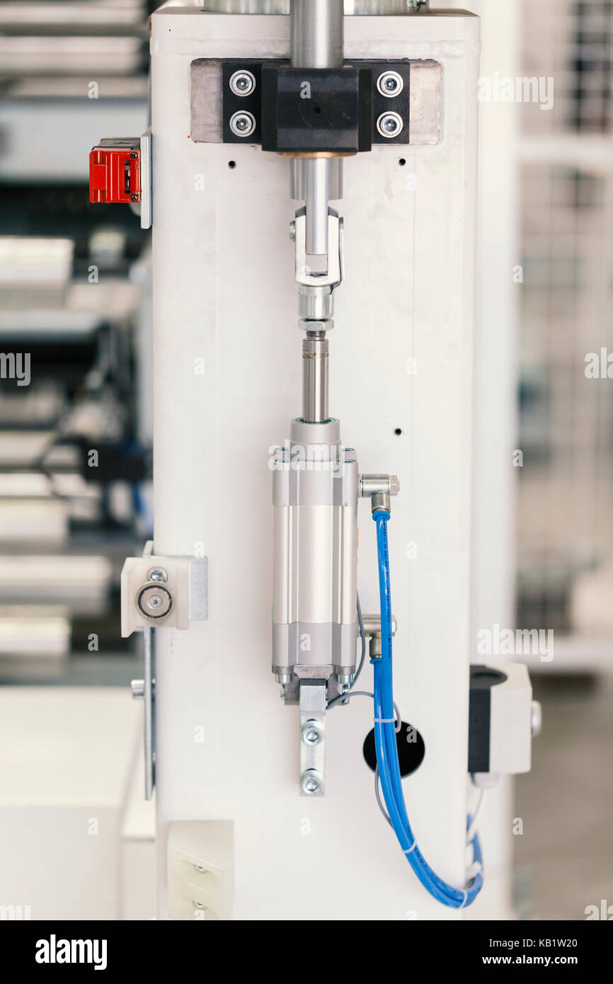 pneumatic piston unit on industrial machine, close up Stock Photo - Alamy