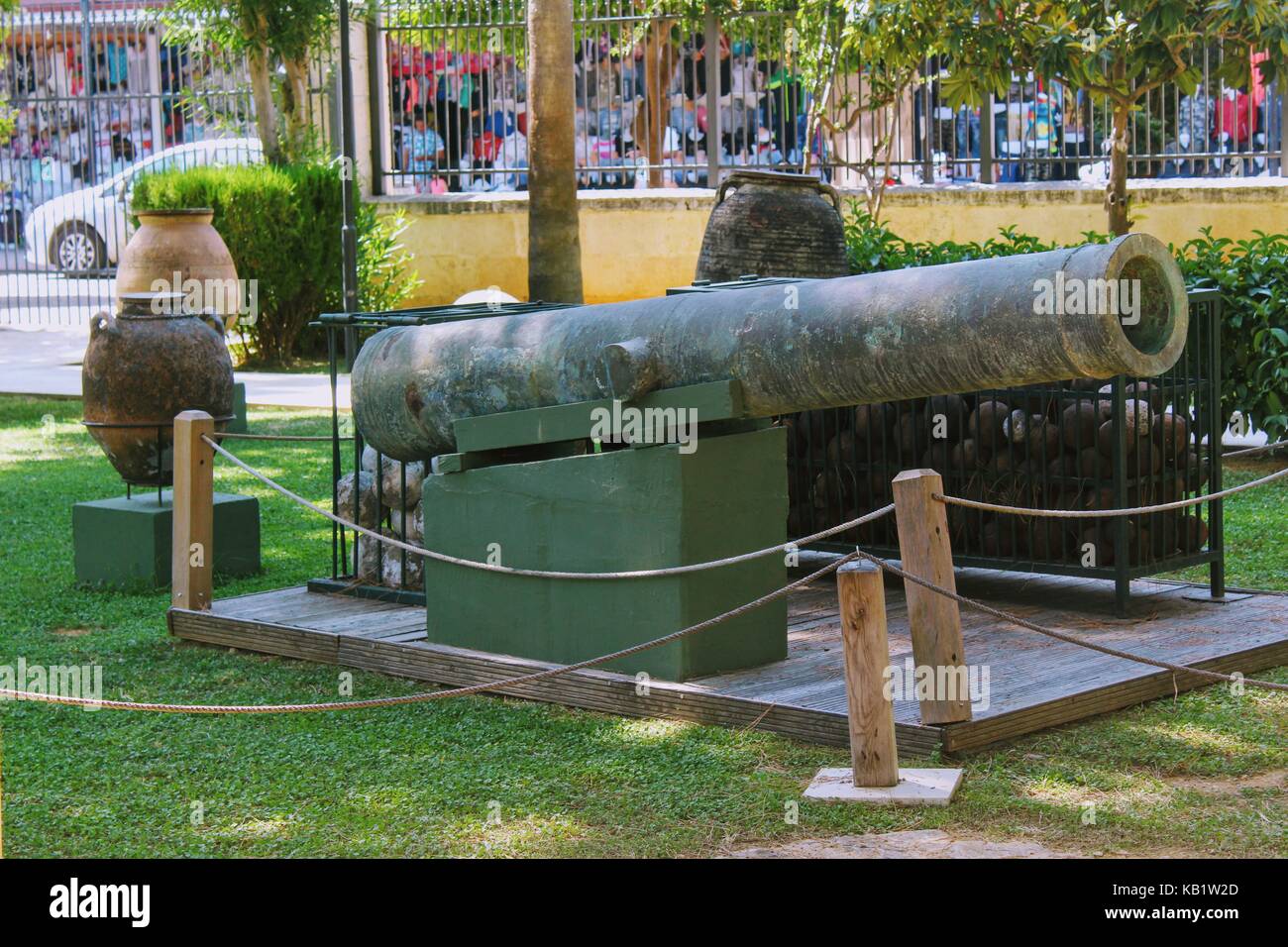 An old cannon and cannonballs in the inner courtyard of the Alanya ...