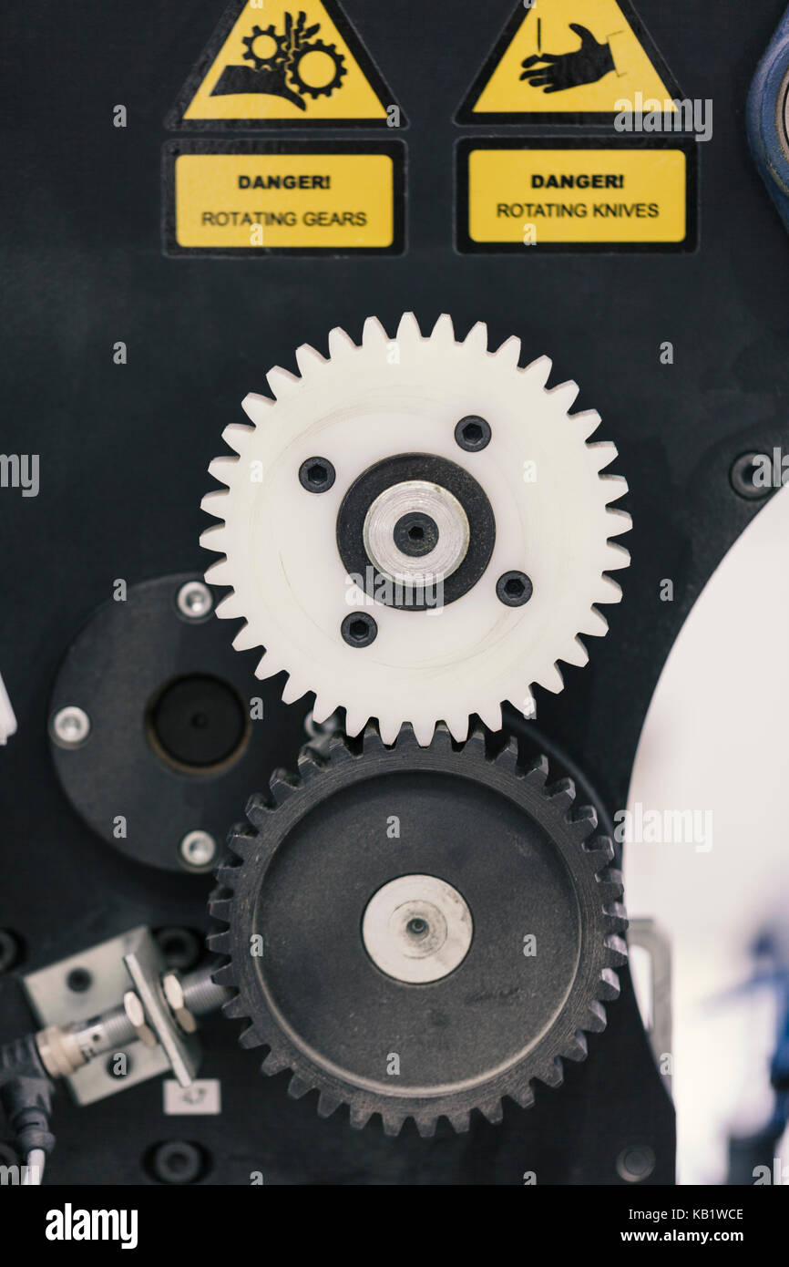 rotating gears on machine for printing Stock Photo - Alamy