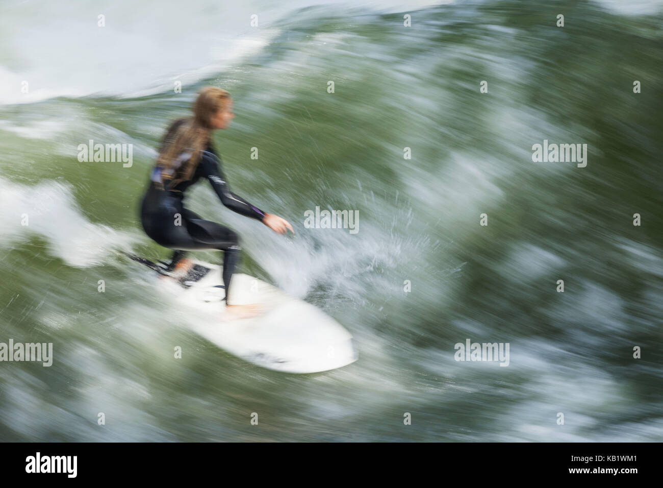 Germany, Bavaria, Munich, English garden, ice brook, wave, surfer Stock ...
