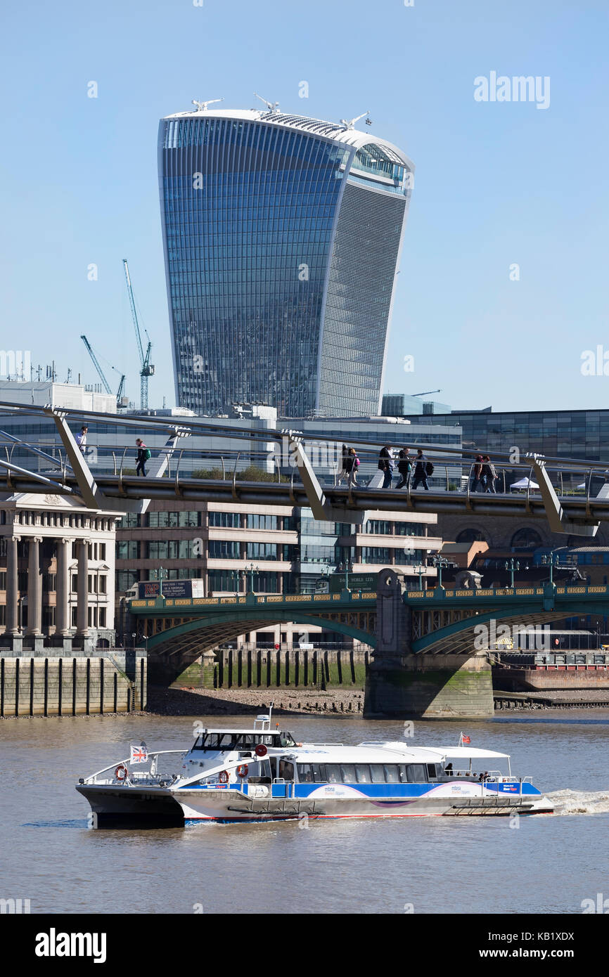 LONDON - SEPTEMBER 2017; A boat on the Thames river with the Sky Garden ...