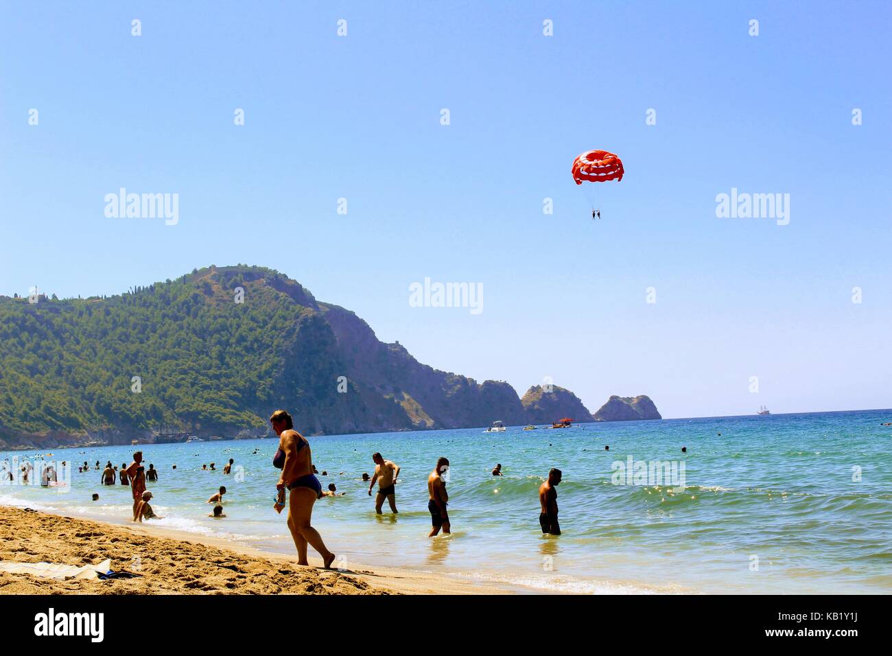 July, 2017 - Vacationers bathe in the sea and sunbathe in the sun on ...