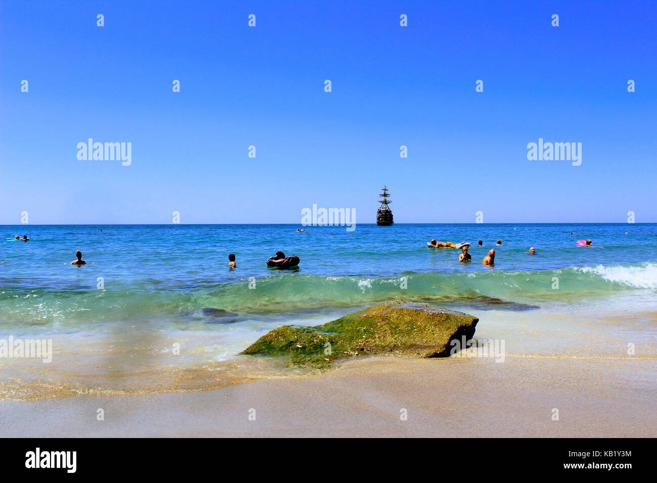 July, 2017 - Vacationers bathe in the sea and sunbathe in the sun on ...