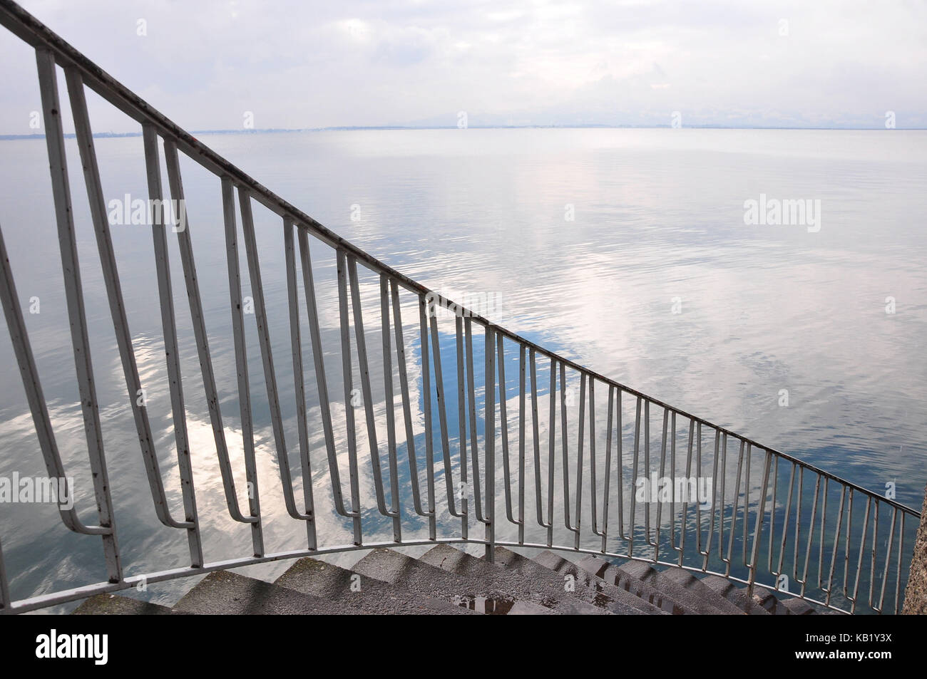 Stairs, railing, water surface Stock Photo - Alamy