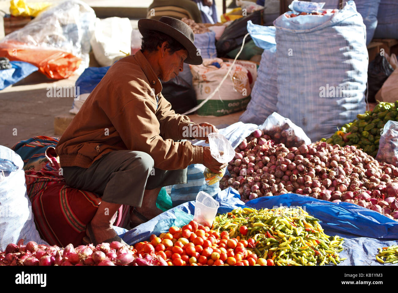 Bolivia, Tarabuco, market, Quechua, man, selling Stock Photo - Alamy