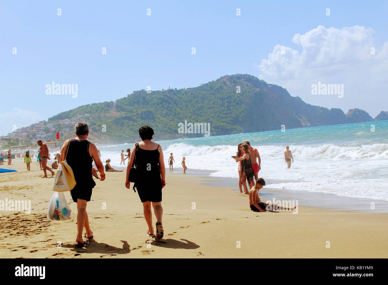 July, 2017 - Vacationers bathe in the sea and sunbathe in the sun on ...
