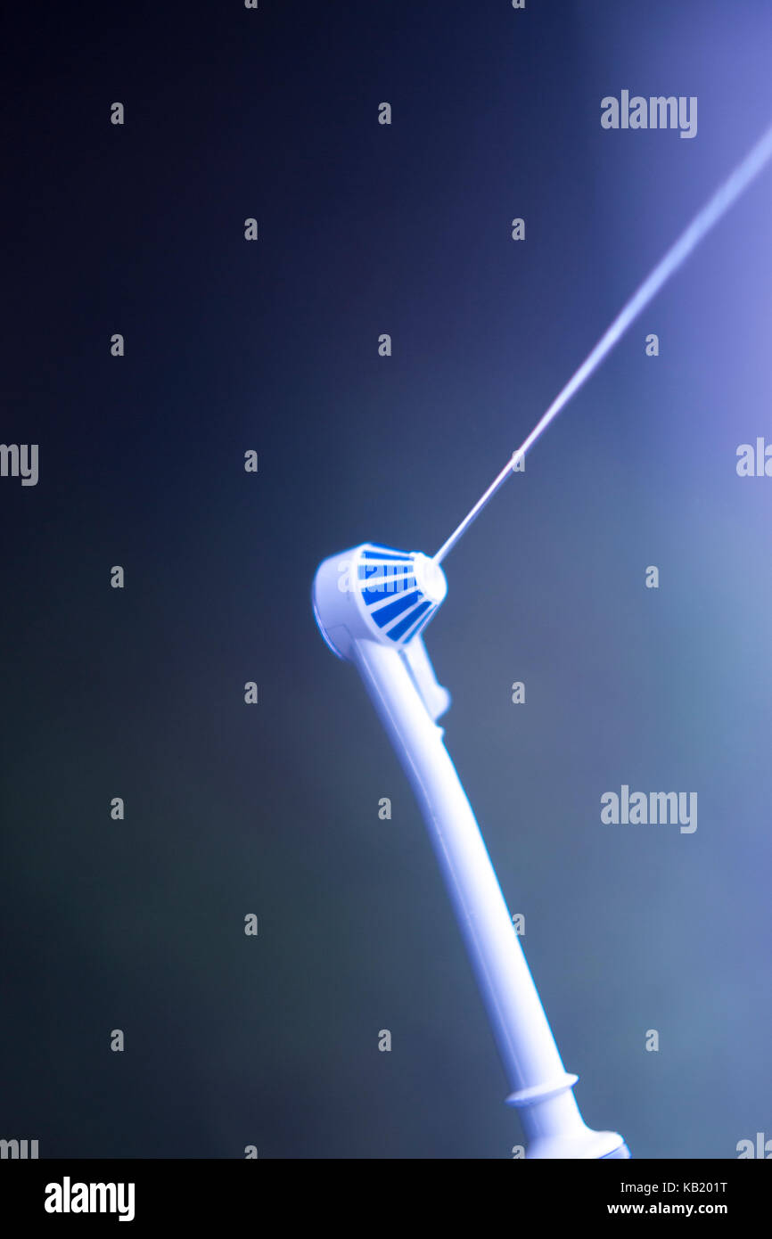 Dental water spray cleaner for interdental hygiene Stock Photo - Alamy