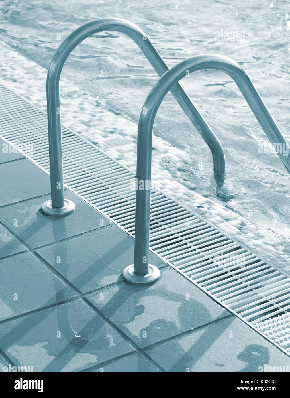 Blue swimming pool on hot sunny day on summer vacation Stock Photo - Alamy