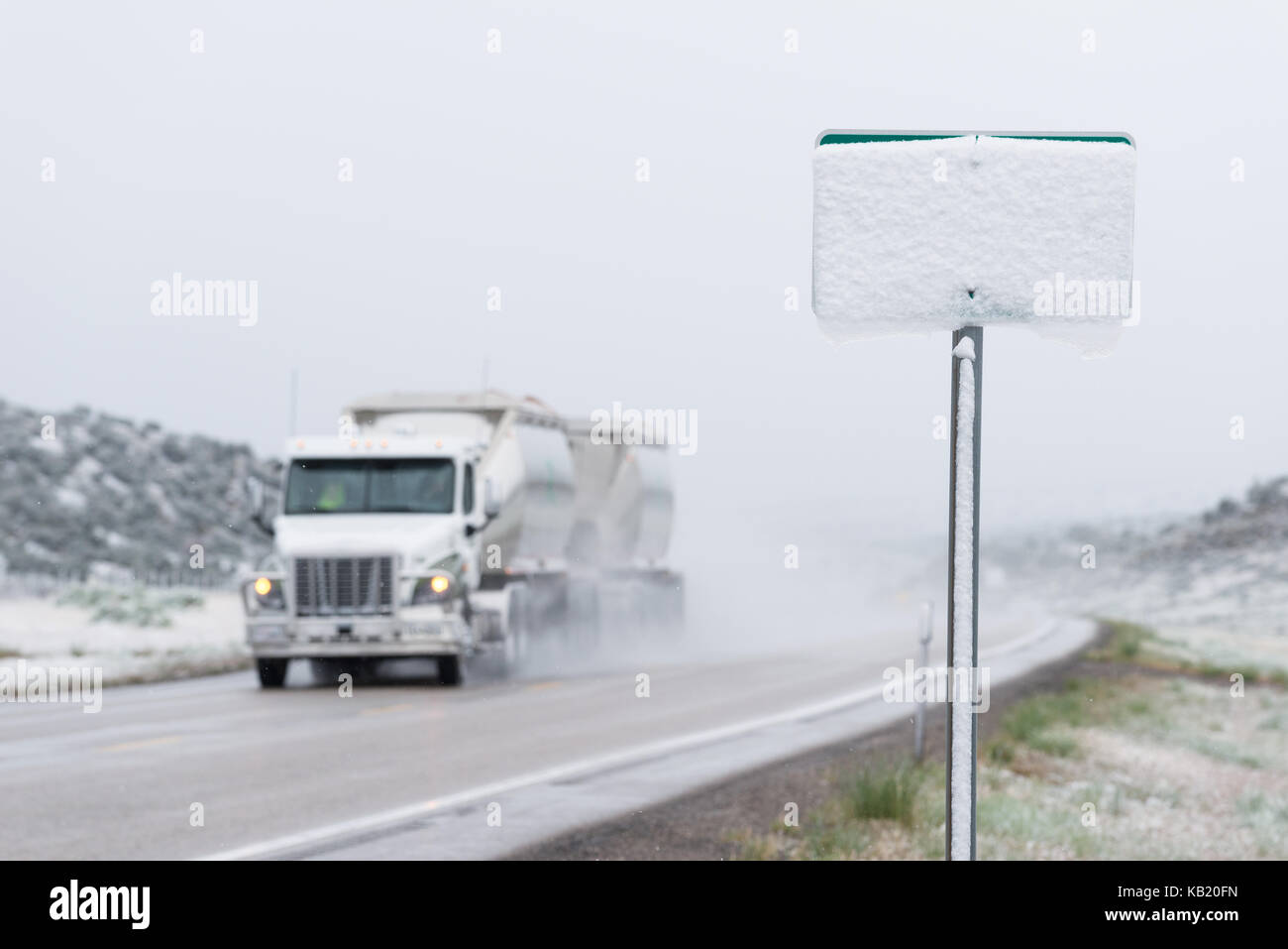 Snow covered highway sign in Utah Stock Photo - Alamy