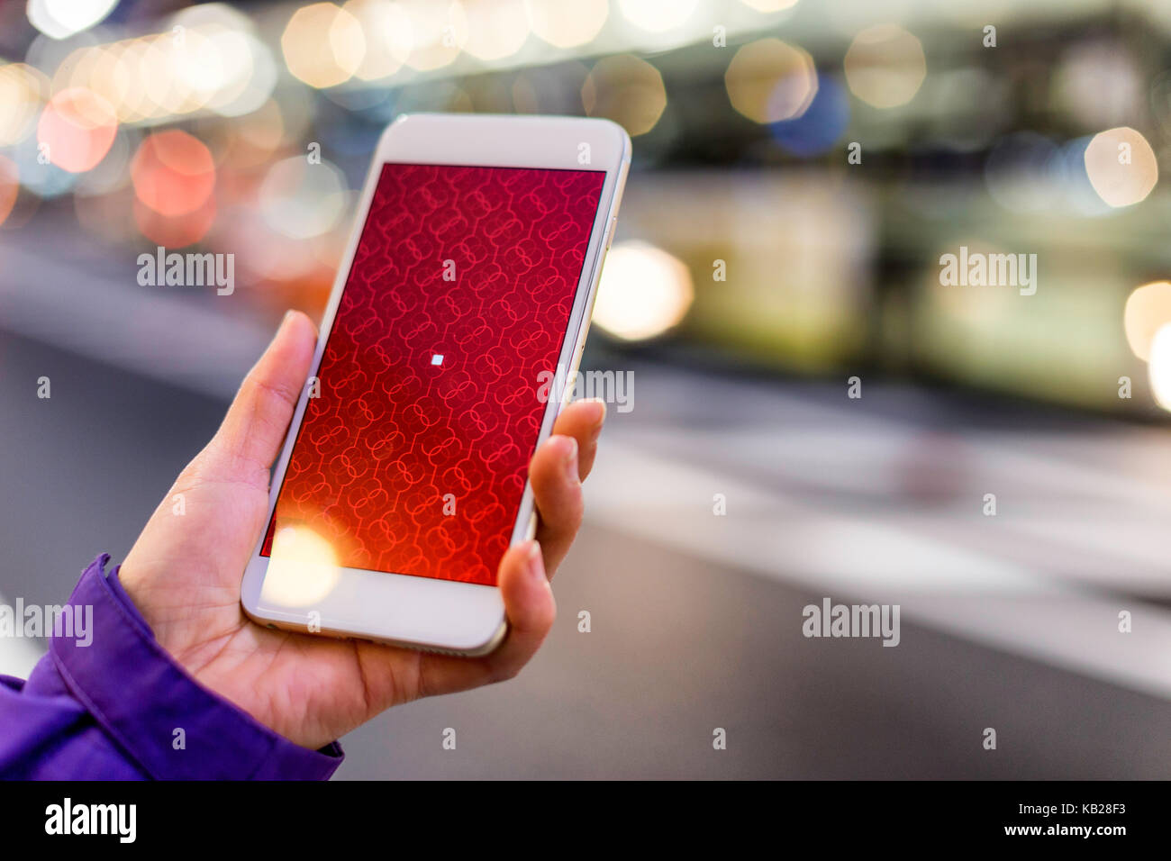 hand and mobile phone with abstract pattern Stock Photo - Alamy