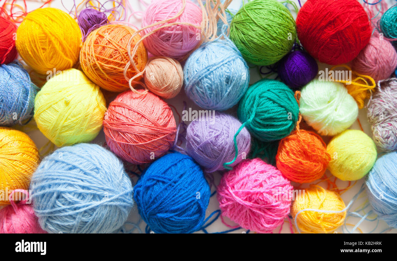 Colored balls of yarn. View from above. Rainbow colors. All colors ...