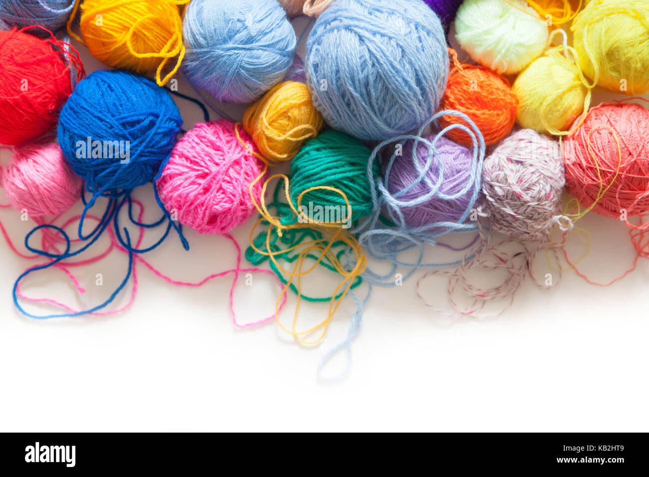 Colored balls of yarn. View from above. Rainbow colors. All colors ...