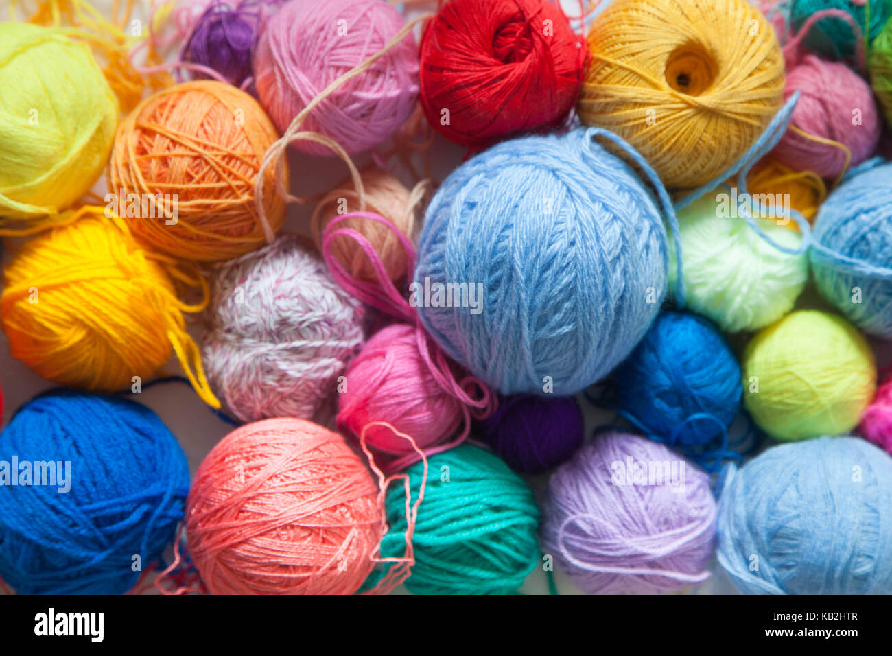 Colored balls of yarn. View from above. Rainbow colors. All colors ...