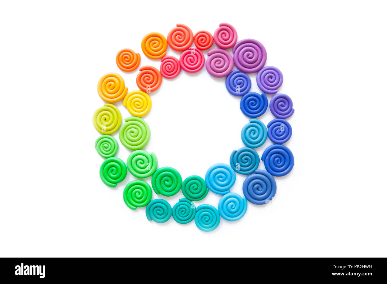 Frame made of plasticine. Twisted colored spirals of plastic of ...