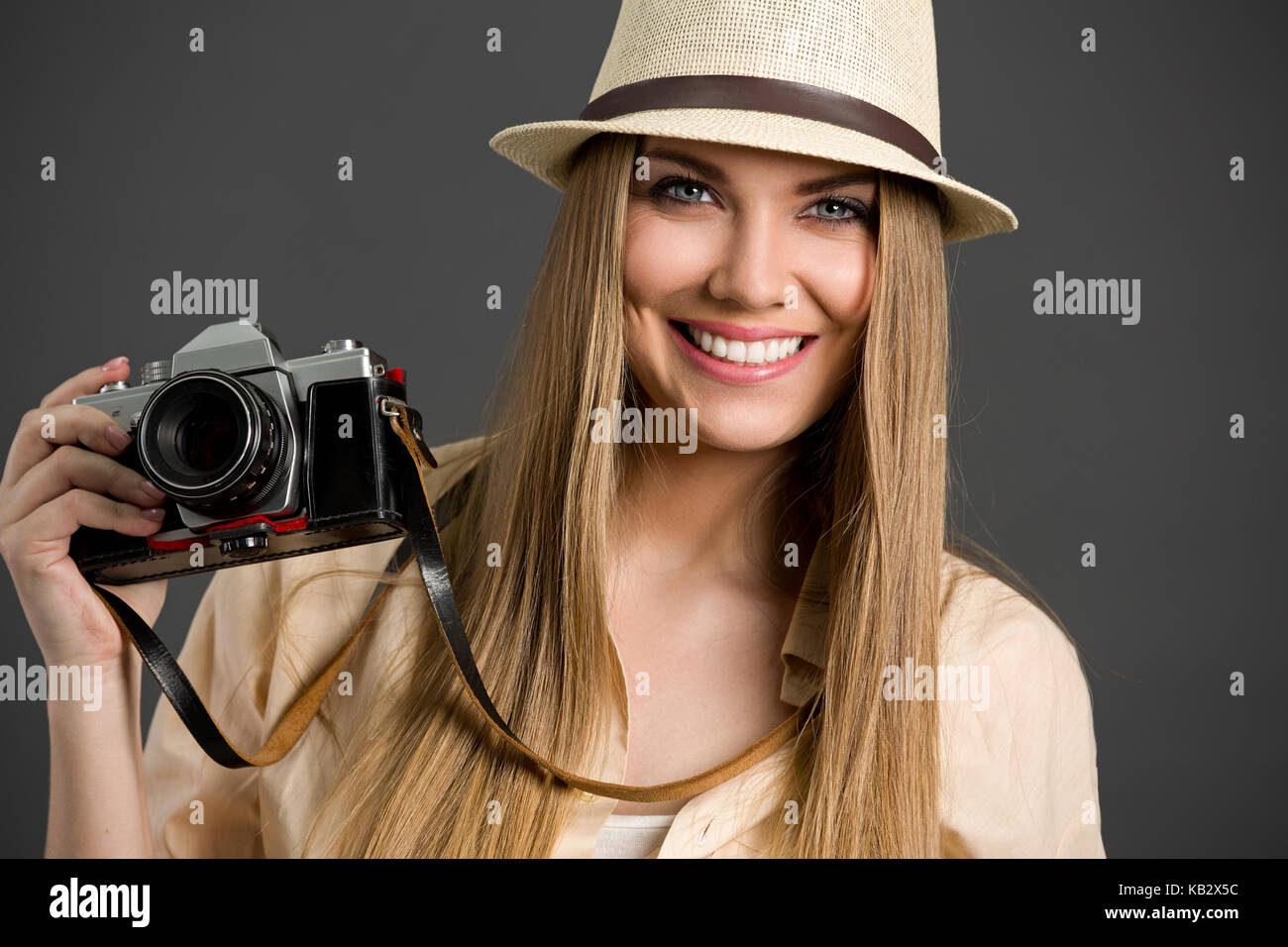 World map and camera person hi-res stock photography and images - Alamy