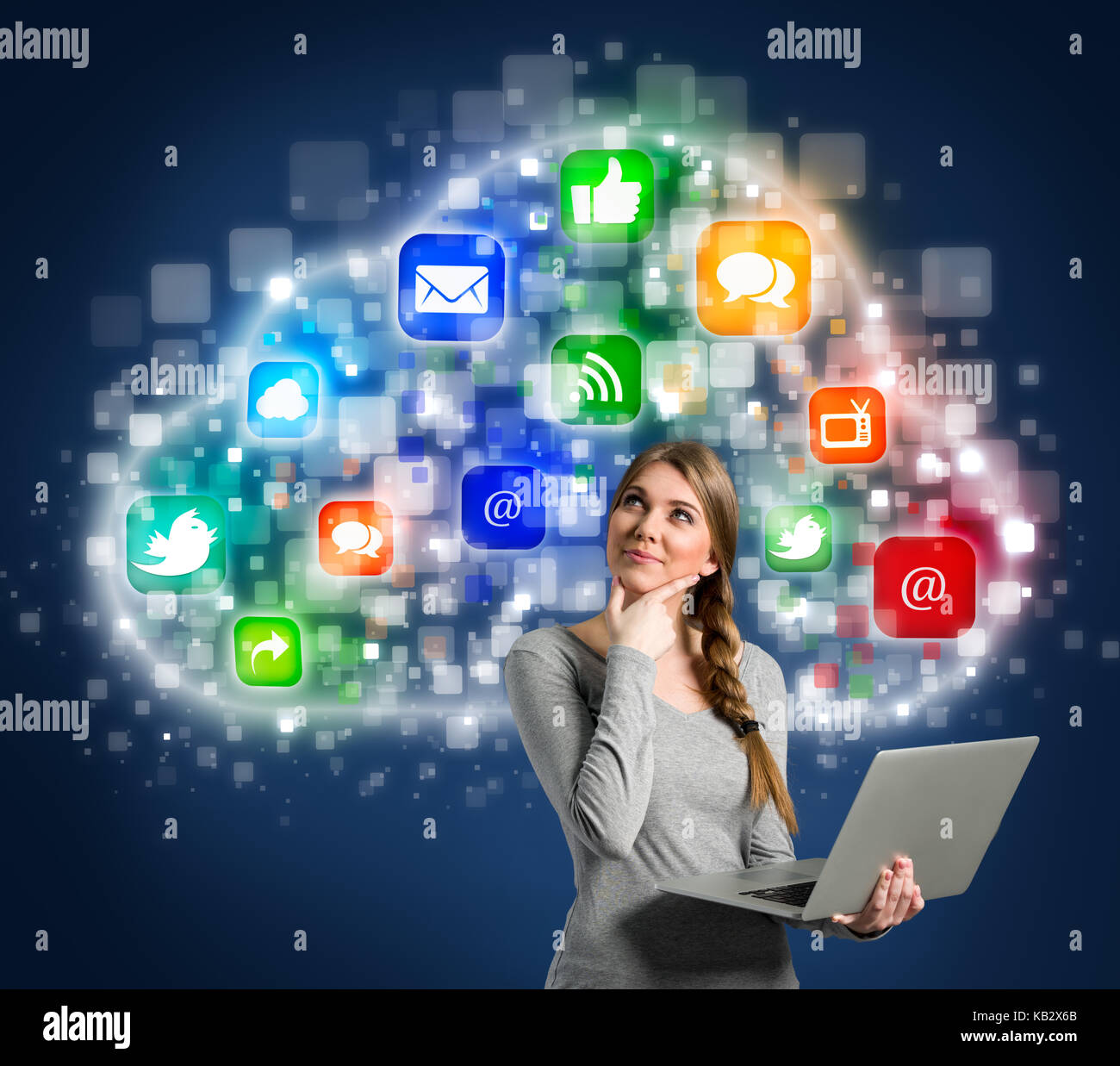Multimedia storage - girl with laptop looking at clouds with multimedia ...