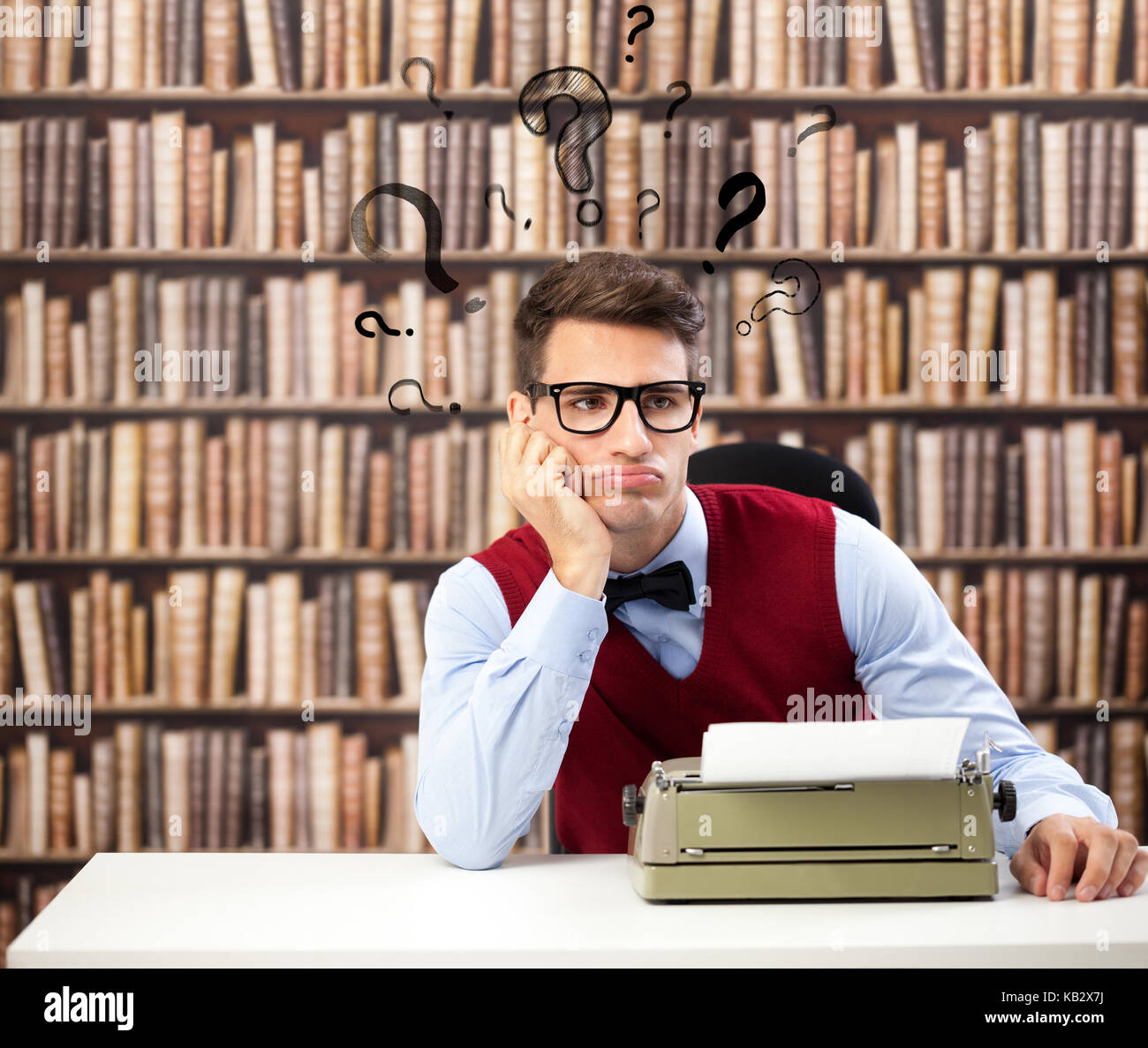 Old fashioned writer thinking with question marks over head Stock Photo ...