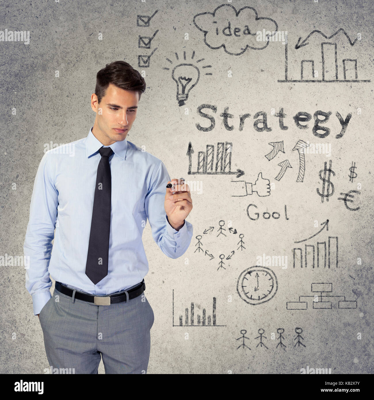 handsome businessmen drawing success business strategy Stock Photo - Alamy
