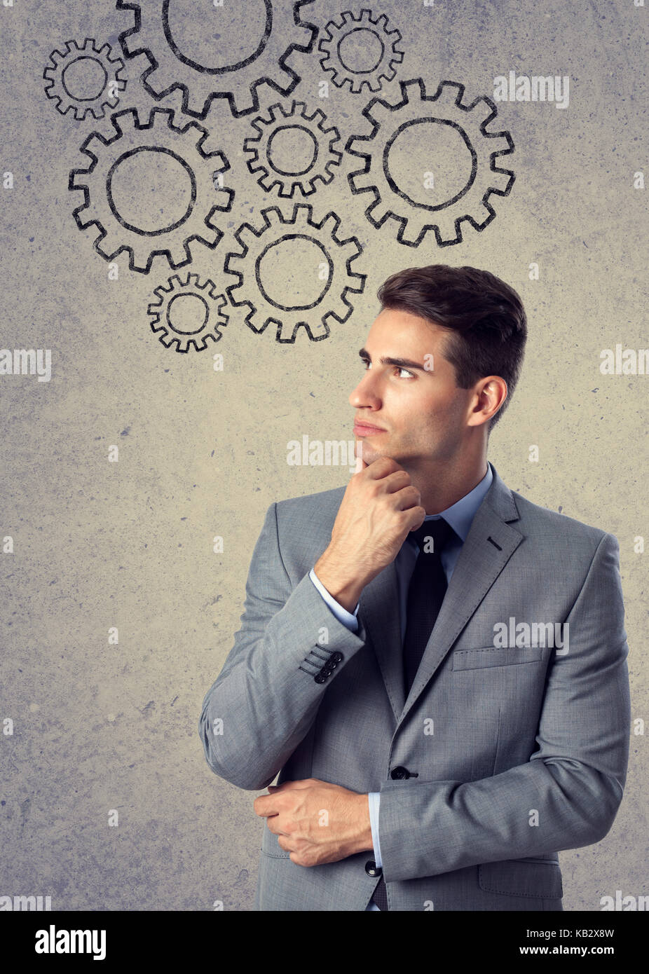 businessman thinking with a draw a gear system Stock Photo - Alamy