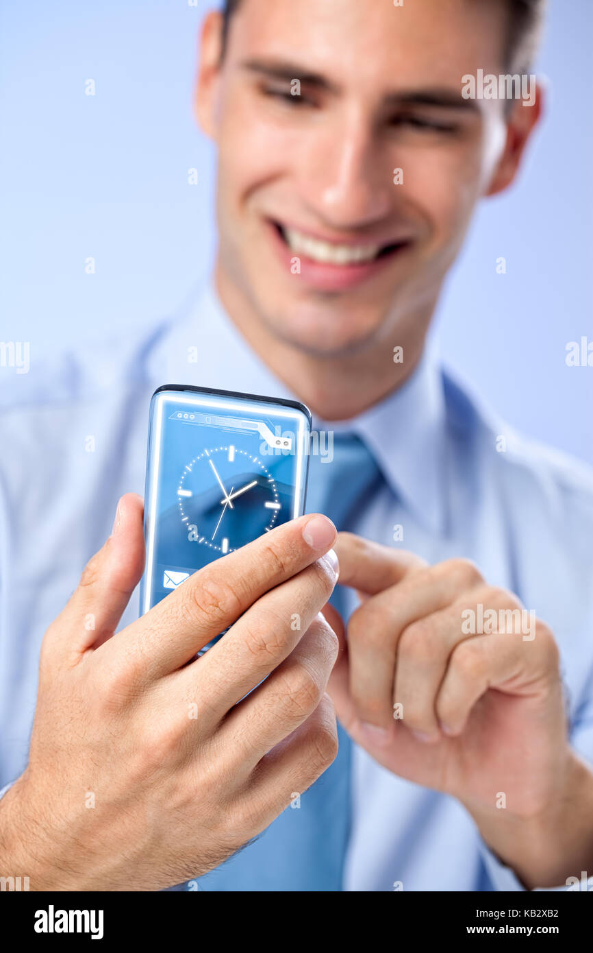 Young man with transparent futuristic phone, concept actual future ...