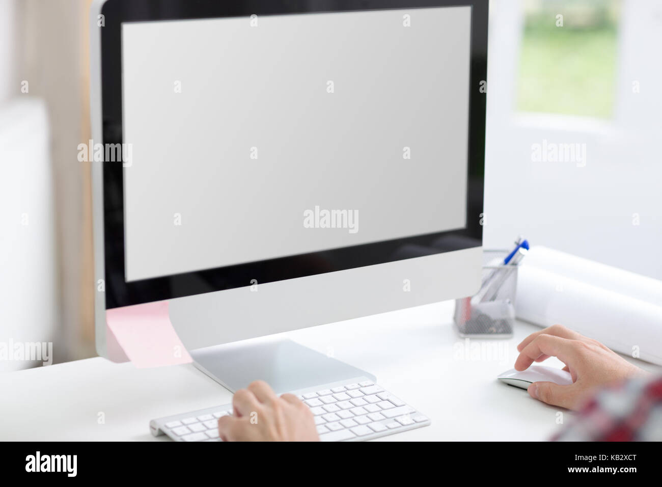 empty computer screen on work desk Stock Photo - Alamy