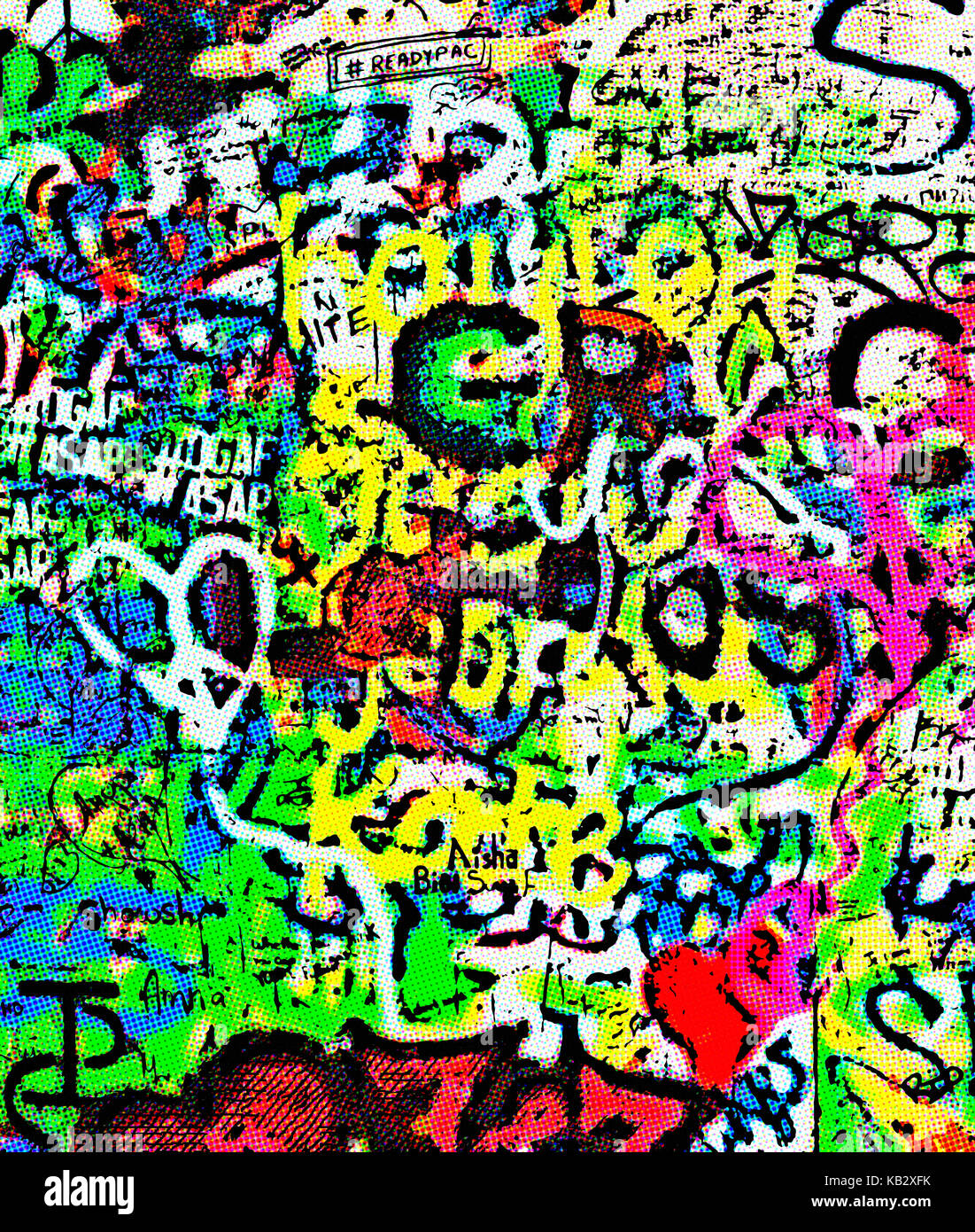 Multi coloured Spray drawings and writings on dark wall Stock Photo - Alamy