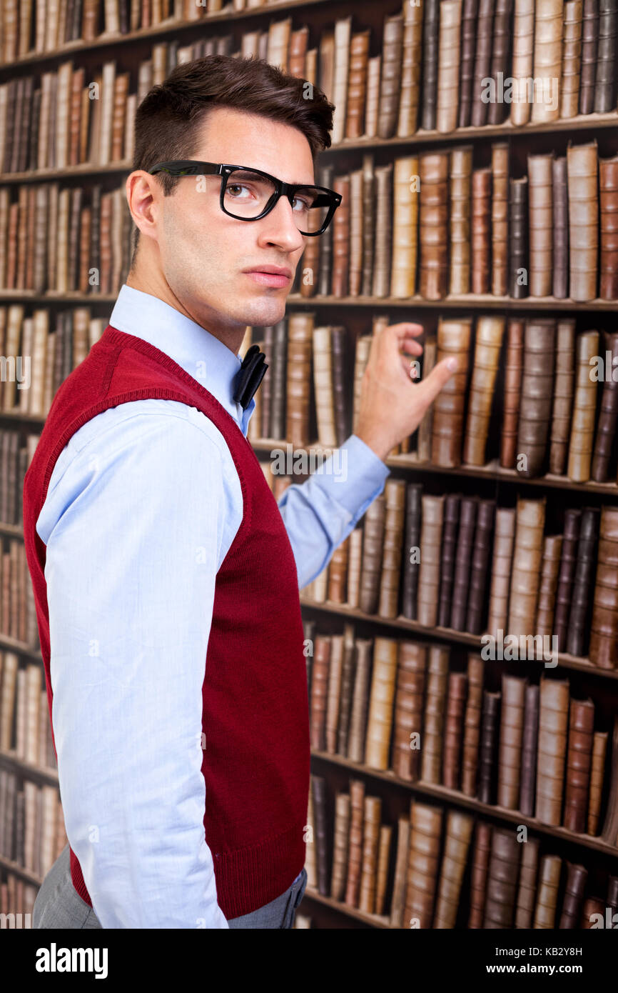 Man carrying books library hi-res stock photography and images - Alamy
