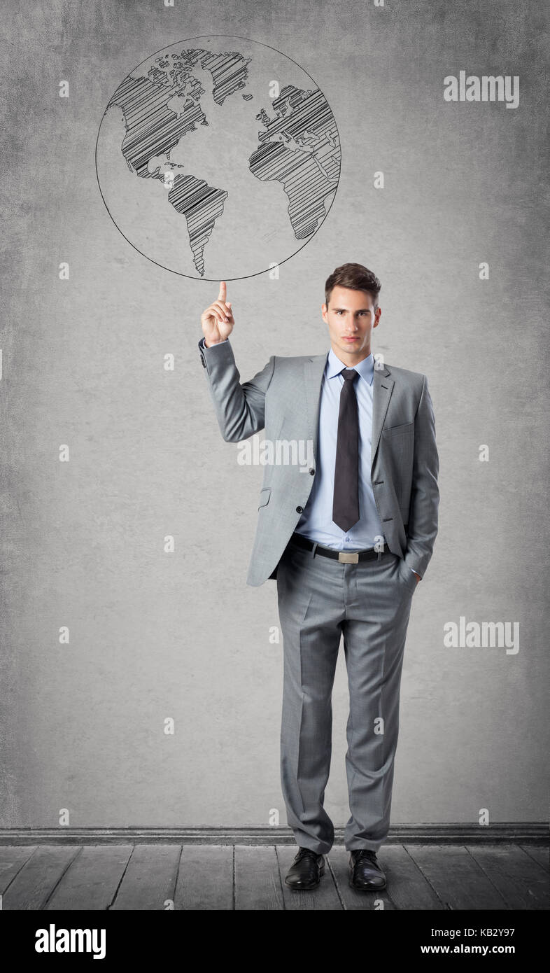 Businessman holding world map on finger Stock Photo - Alamy