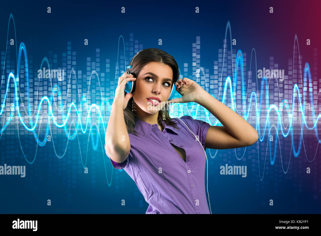 attractive woman with headphone listening to music with color equalizer ...