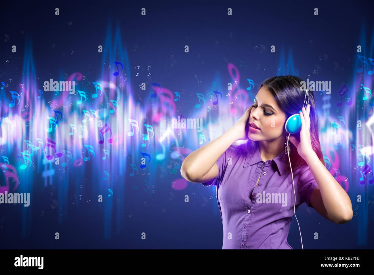 woman enjoying in music over design background Stock Photo - Alamy