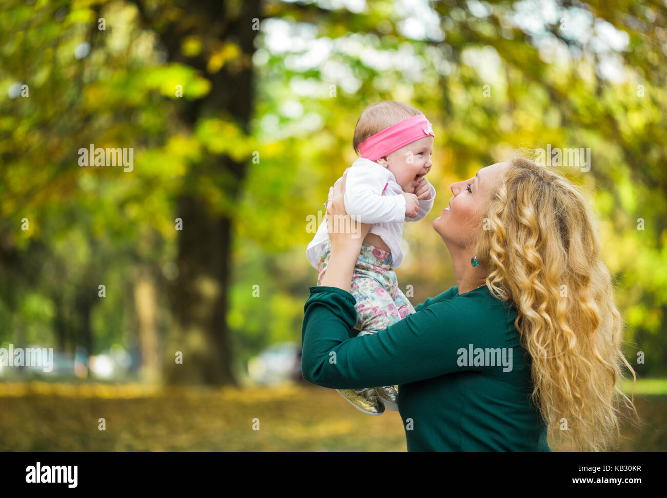 Baby enjoying mother hi-res stock photography and images - Alamy