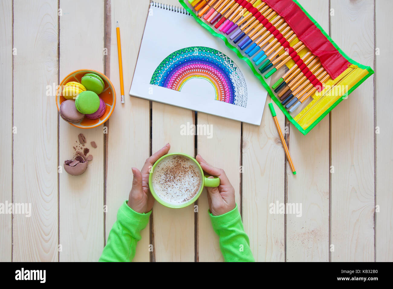 Girl draws a rainbow. Positive drawing. Art therapy and relaxation ...
