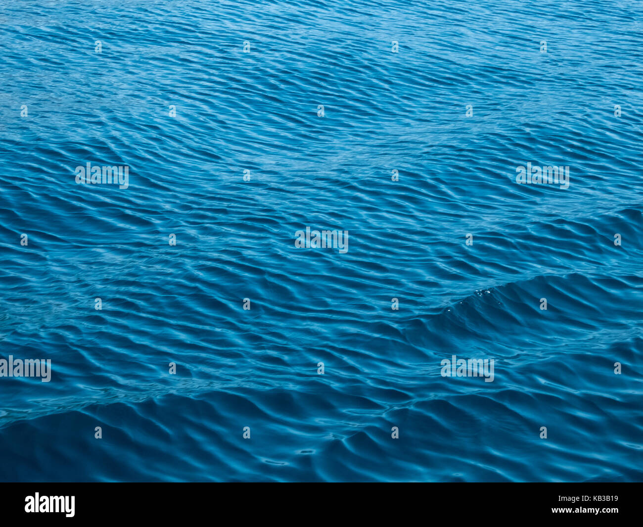 Blue sea water with ripples Stock Photo - Alamy