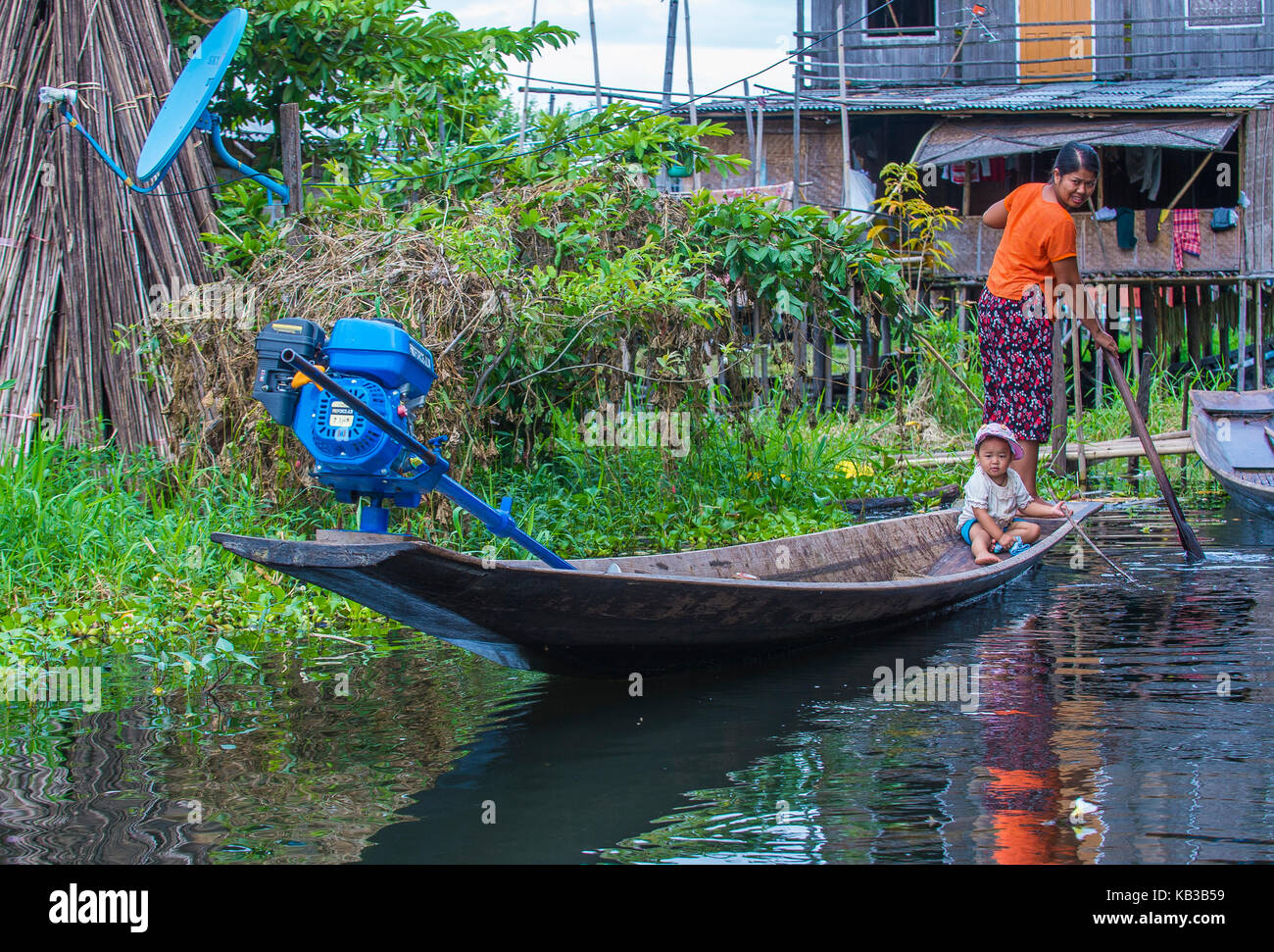 Intha man on his boat in Inle lake Myanmar Stock Photo - Alamy