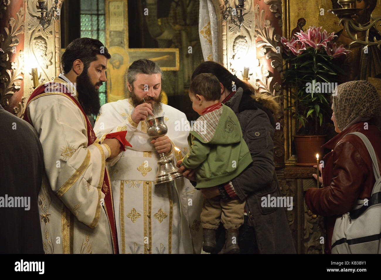 Priests and monks hold an orthodox service at the Easter night of ...