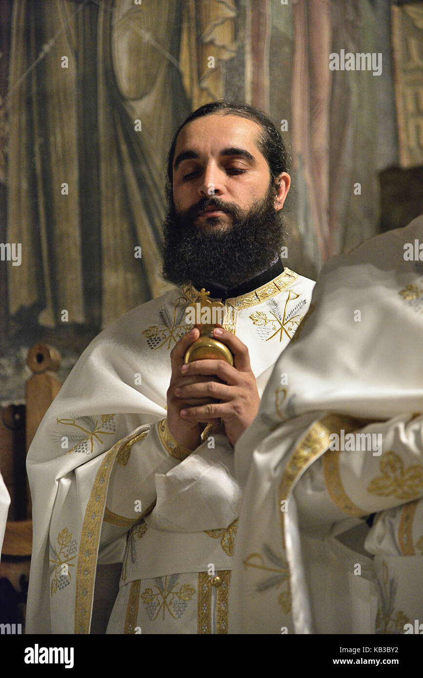 Priests and monks hold an orthodox service at the Easter night of ...