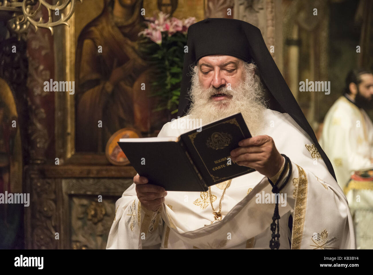 Priests and monks hold an orthodox service at the Easter night of ...