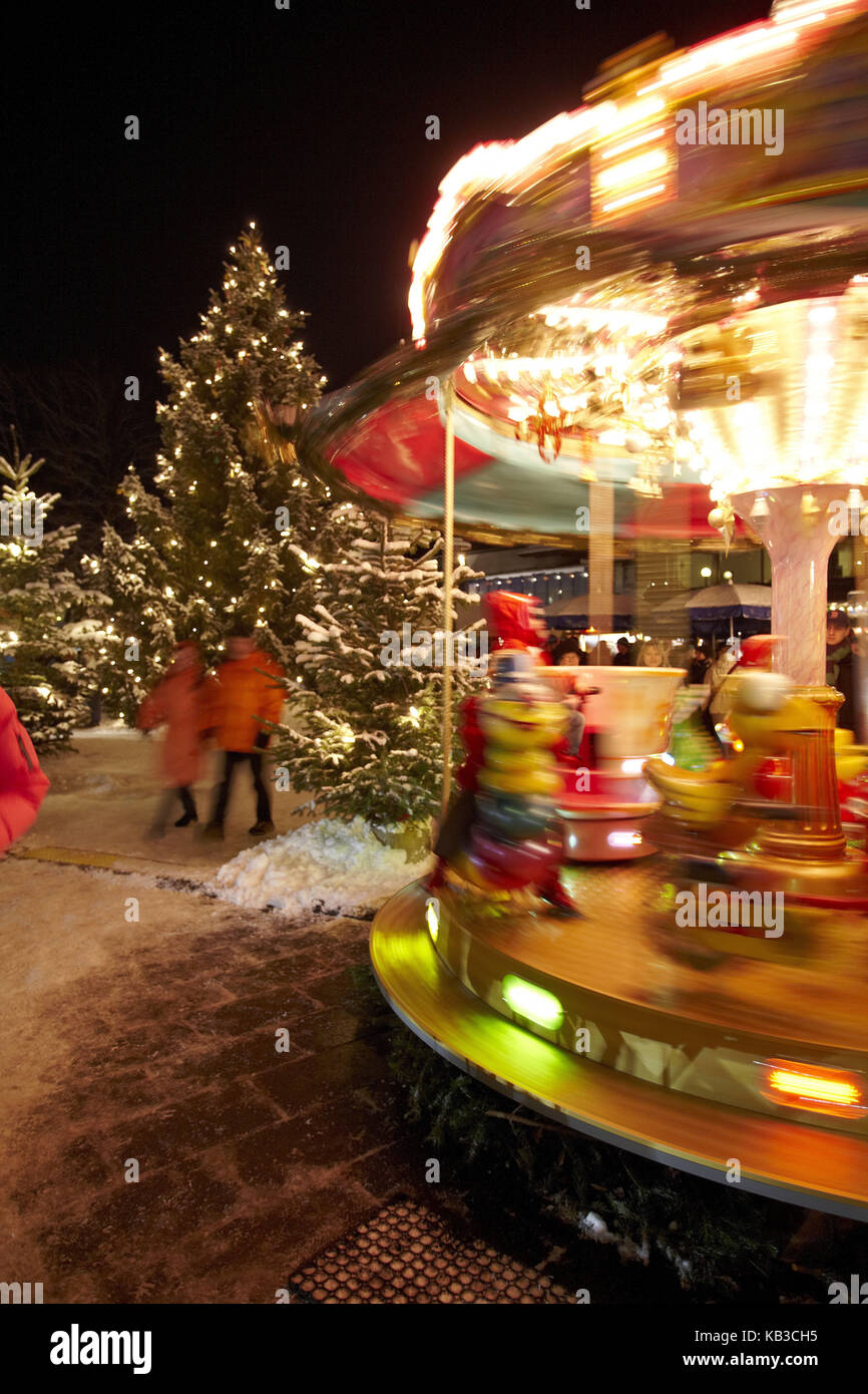 Roundabout on Christmas fair Stock Photo - Alamy