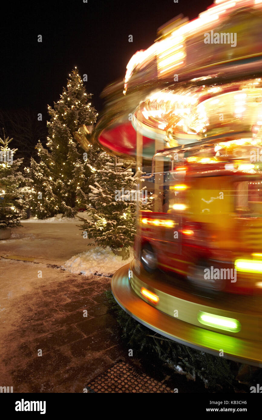 Roundabout on Christmas fair Stock Photo - Alamy