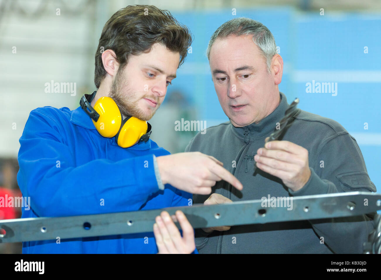 worker with apprentice Stock Photo - Alamy