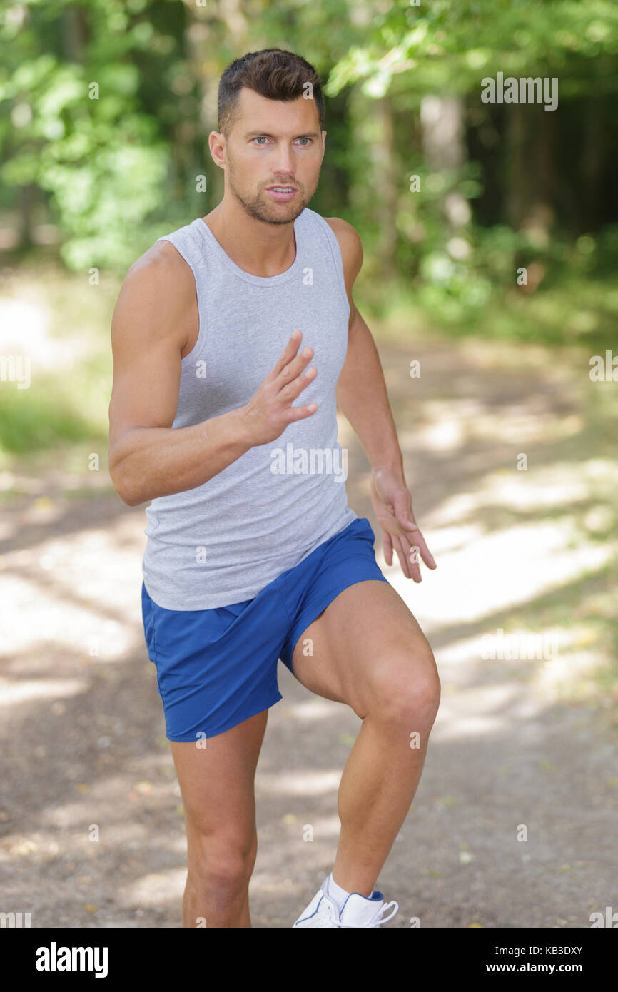 handsome man running outdoors Stock Photo - Alamy