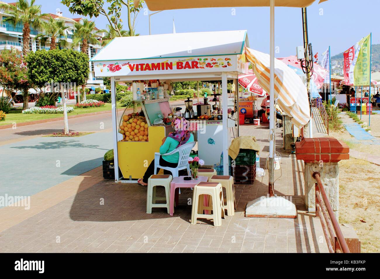 A kiosk with fresh juices and carbonated drinks on the city street ...