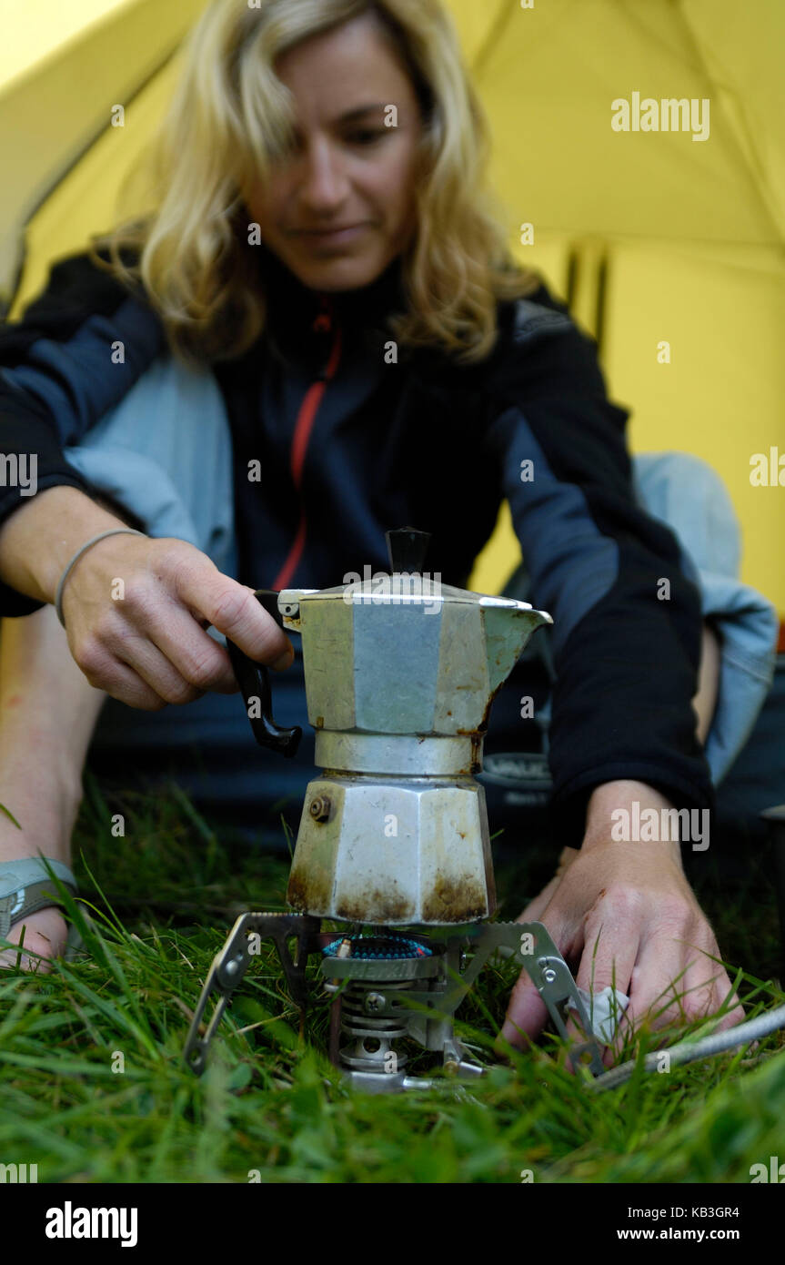 Making coffee in front of the tent hi-res stock photography and images ...