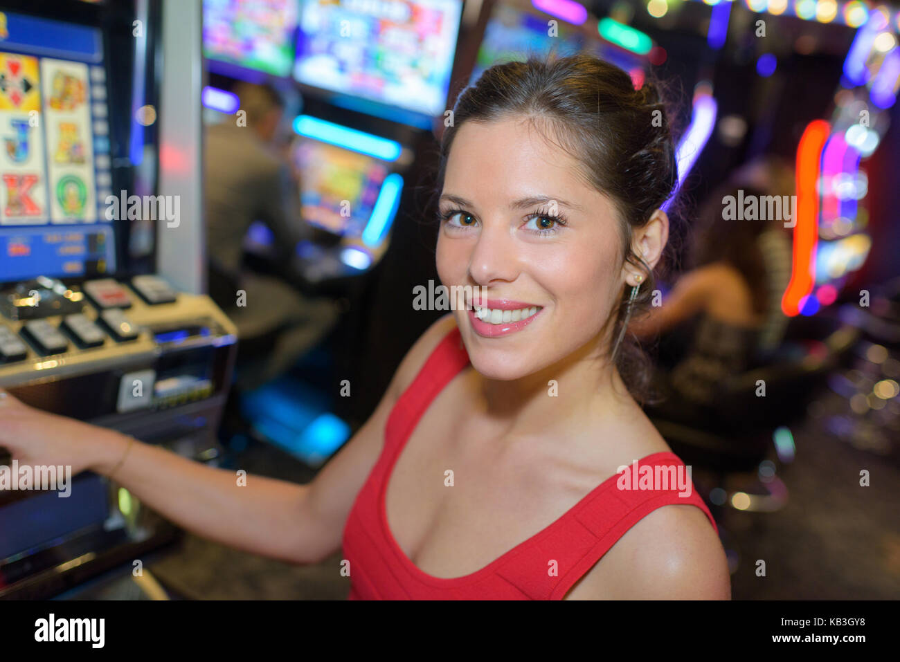 Sitting at gambling machine hi-res stock photography and images - Alamy