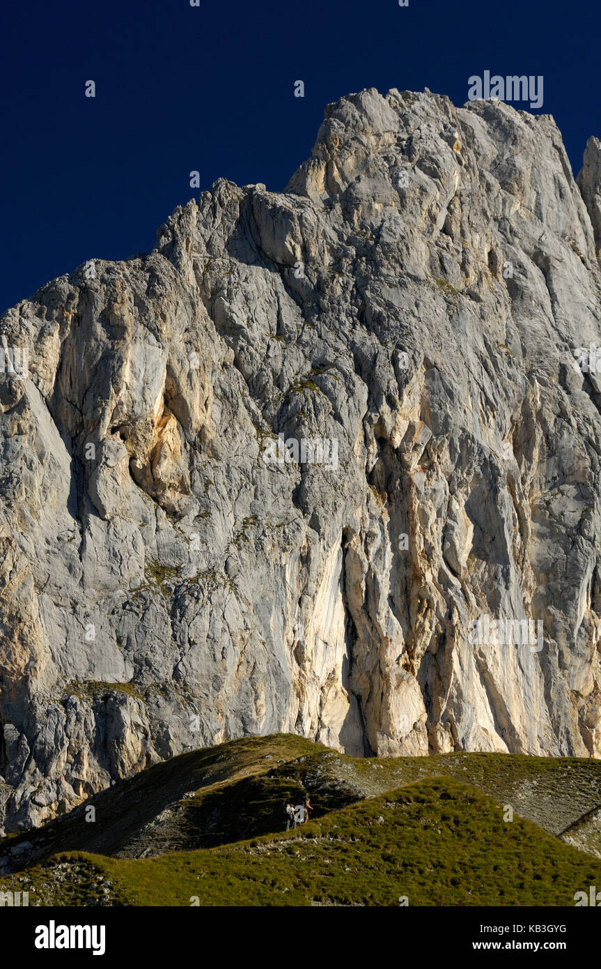 Mountain Hiker with rock face Stock Photo - Alamy