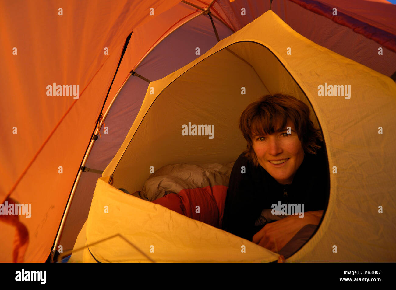 Boy looking out tent hi-res stock photography and images - Alamy